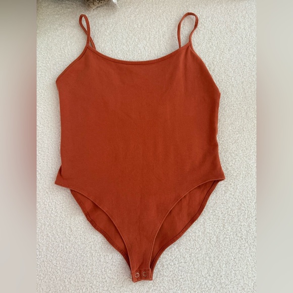 Tops | Orange Body Suit | Poshmark